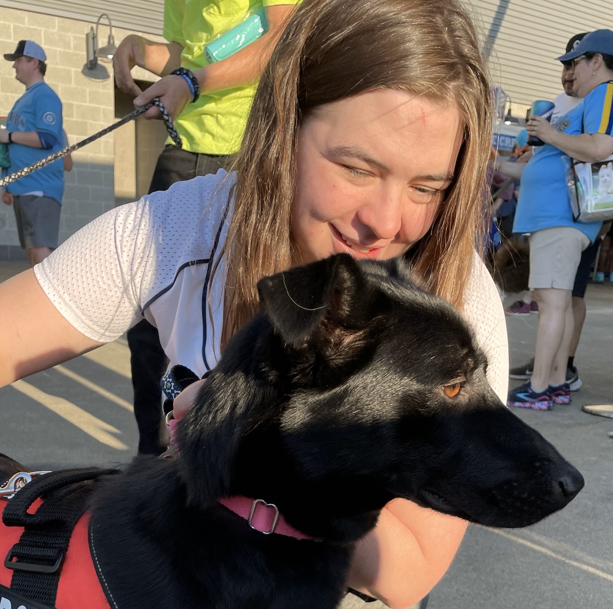 woman hugging dog – Pawsitive Alliance